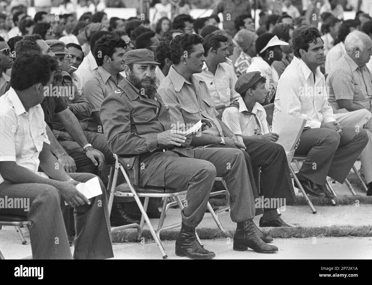 Cuban leader Fidel Castro, second left, attends the opening ceremony of ...
