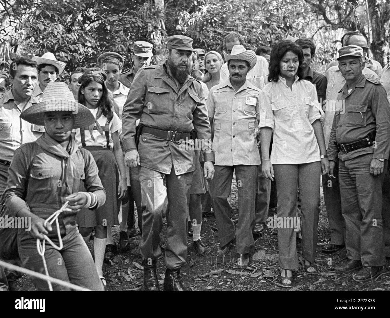 Cuban leader Fidel Castro, watches students show off their camping ...