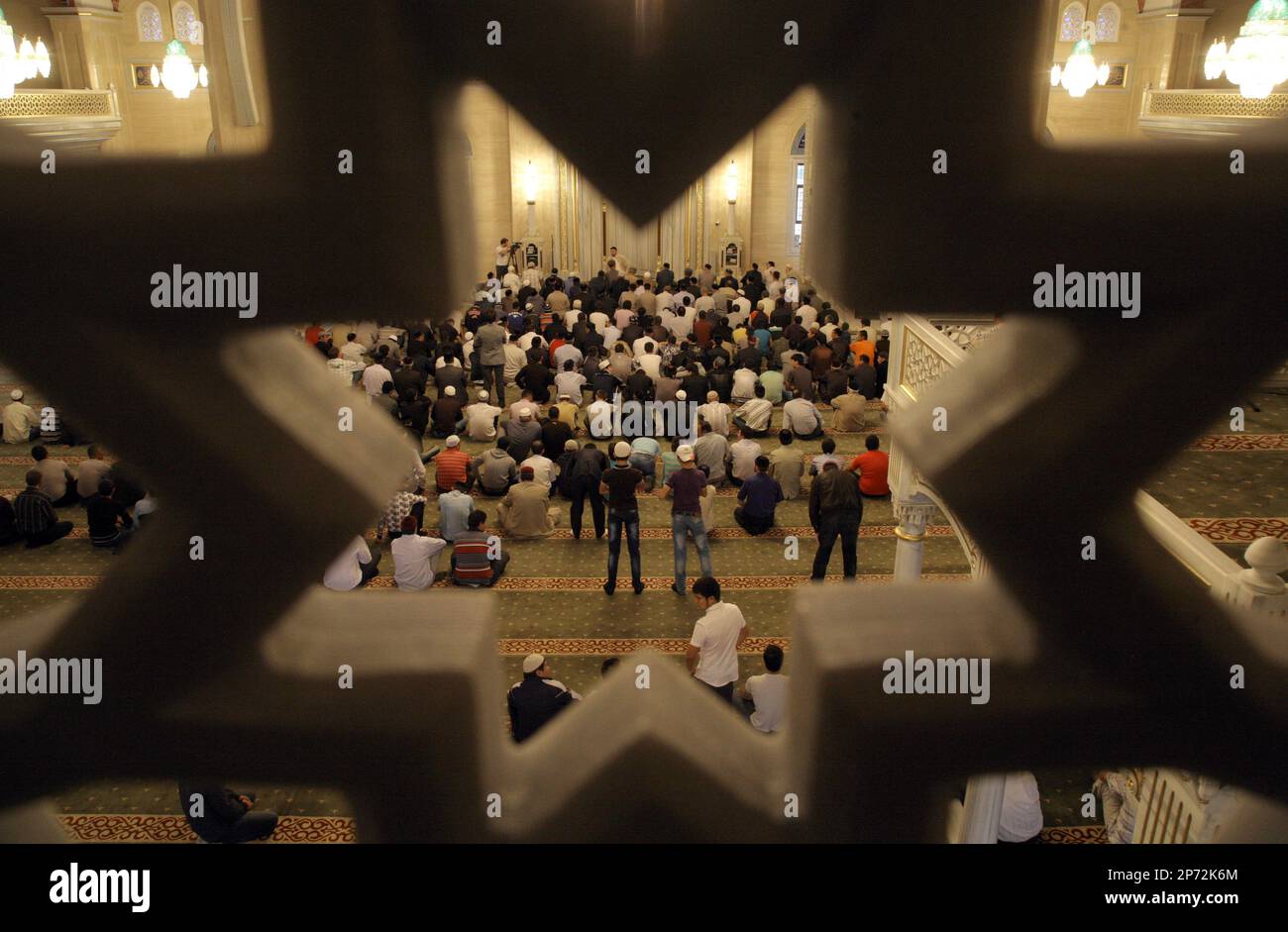 Chechen Muslims attend Eid al-Fitr prayers that marks the end of the ...