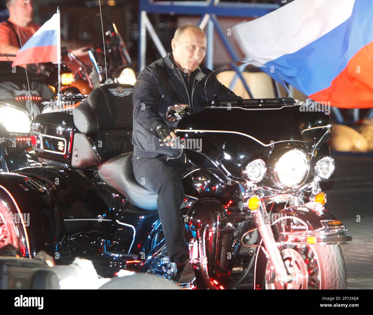 Russian Prime Minister Vladimir Putin rides with enthusiasts during his ...