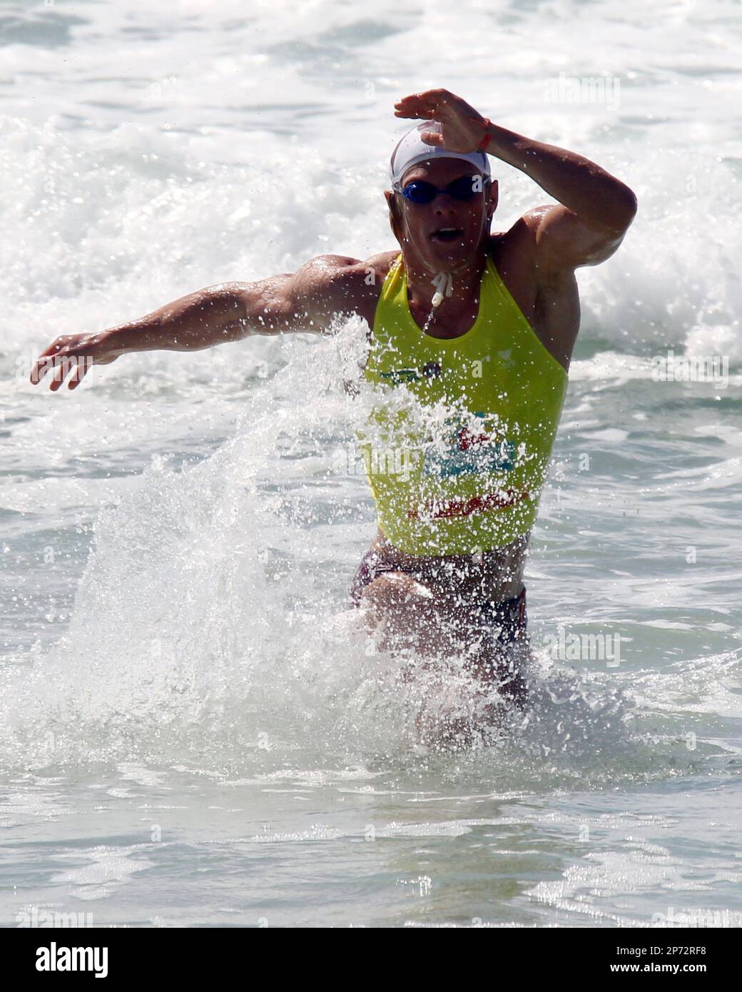 Michael Booth, of Australia, comes out of the water in the mens Taplin ...