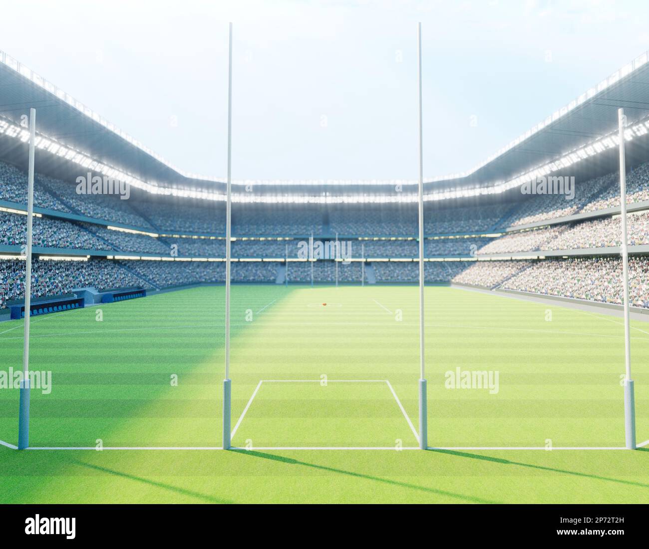 An aussie rules stadium with posts on a marked green grass pitch in the ...