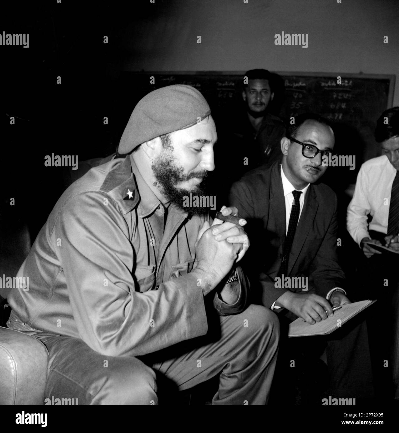 Cuban leader Fidel Castro, left, talks to members of a delegation who ...