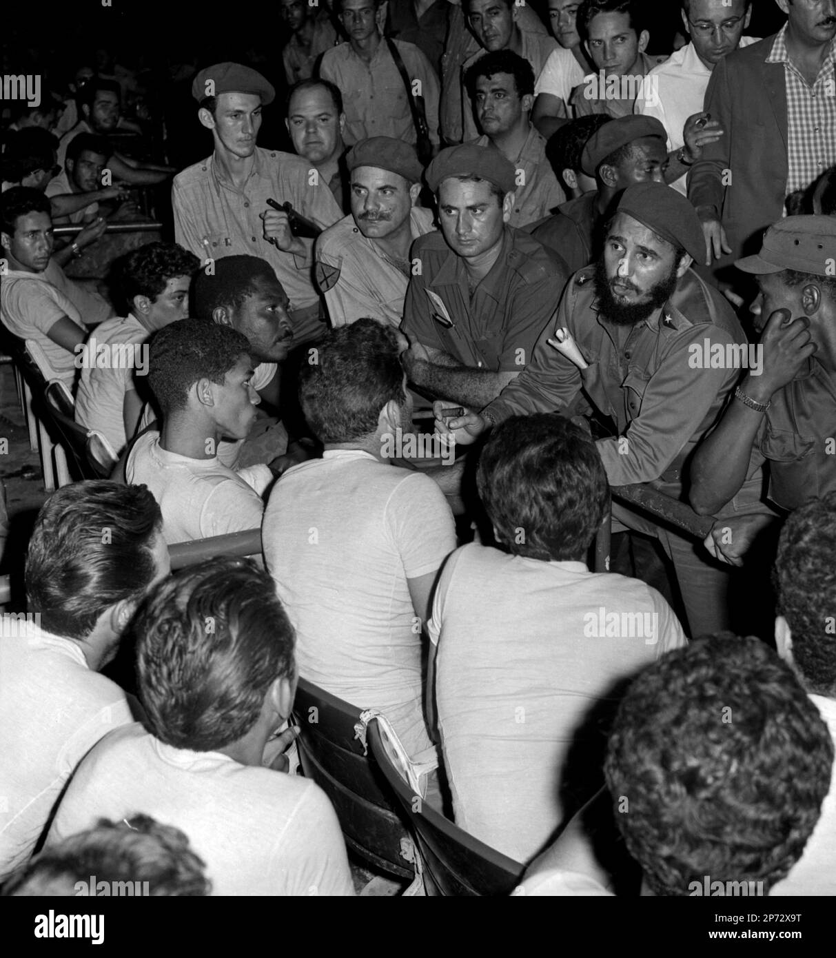 Cuban leader Fidel Castro, left, talks to members of a delegation who ...