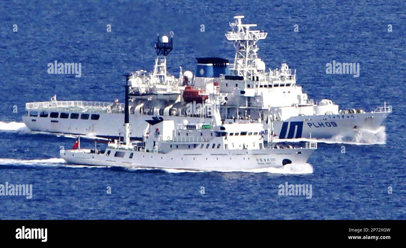 An aerial picture from Yomiuri jetliner shows Japan Coast Guard patrol ...