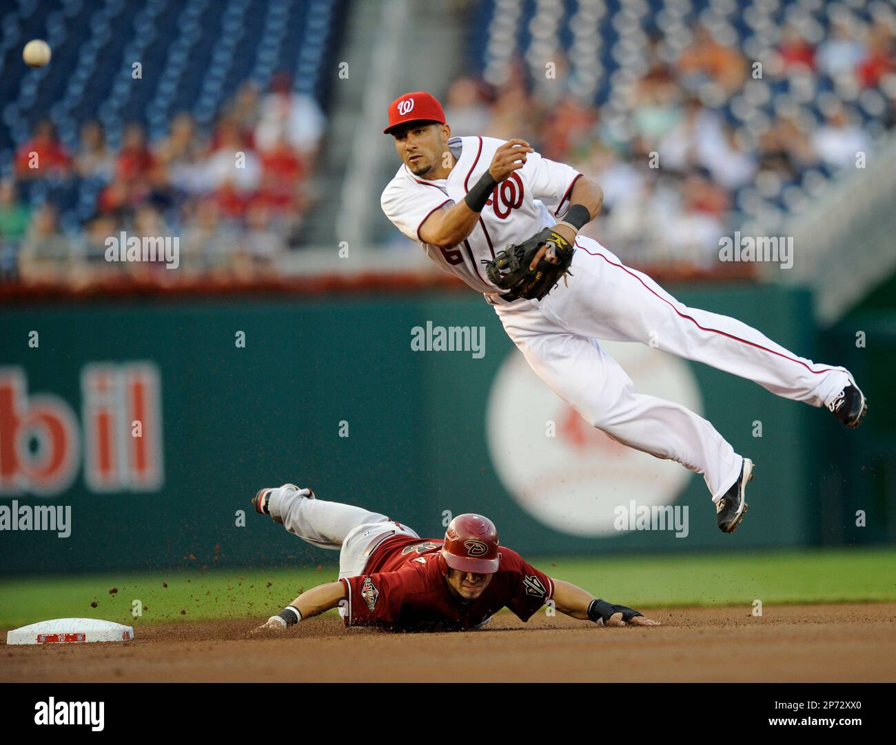 Arizona Diamondbacks left fielder Gerardo Parra, bottom, is out at ...