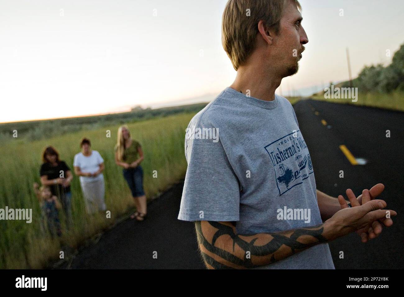 In this Aug. 6, 2011 photo, Steve Norcross stands on the road ...