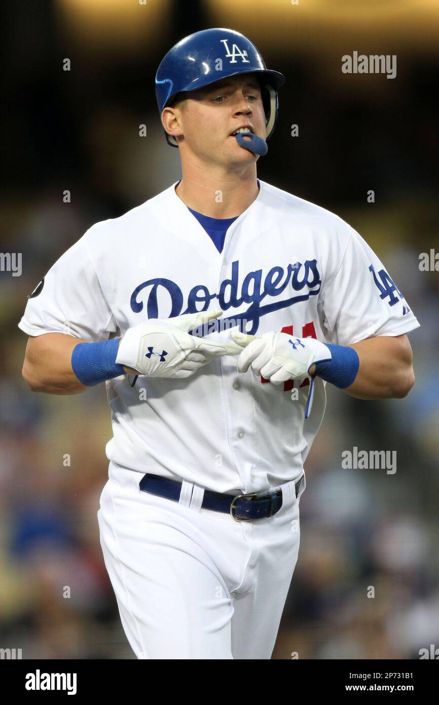 Los Angeles Dodgers outfielder Jerry Sands #47 jogs to first base after ...