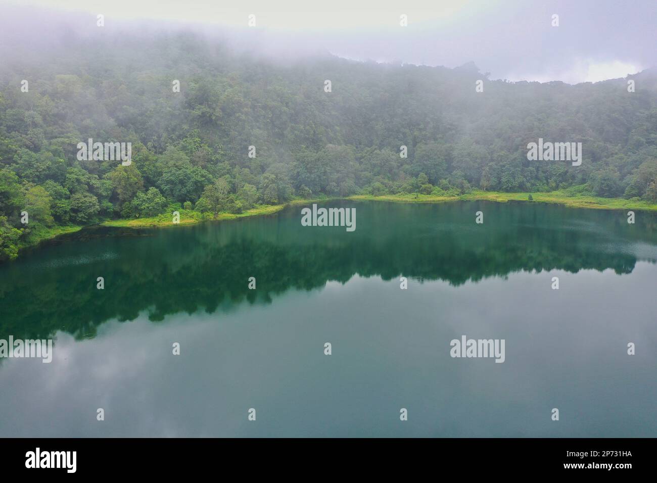 Idyllic shot of the green Rana Mese lake on Flores, surrounded by ...
