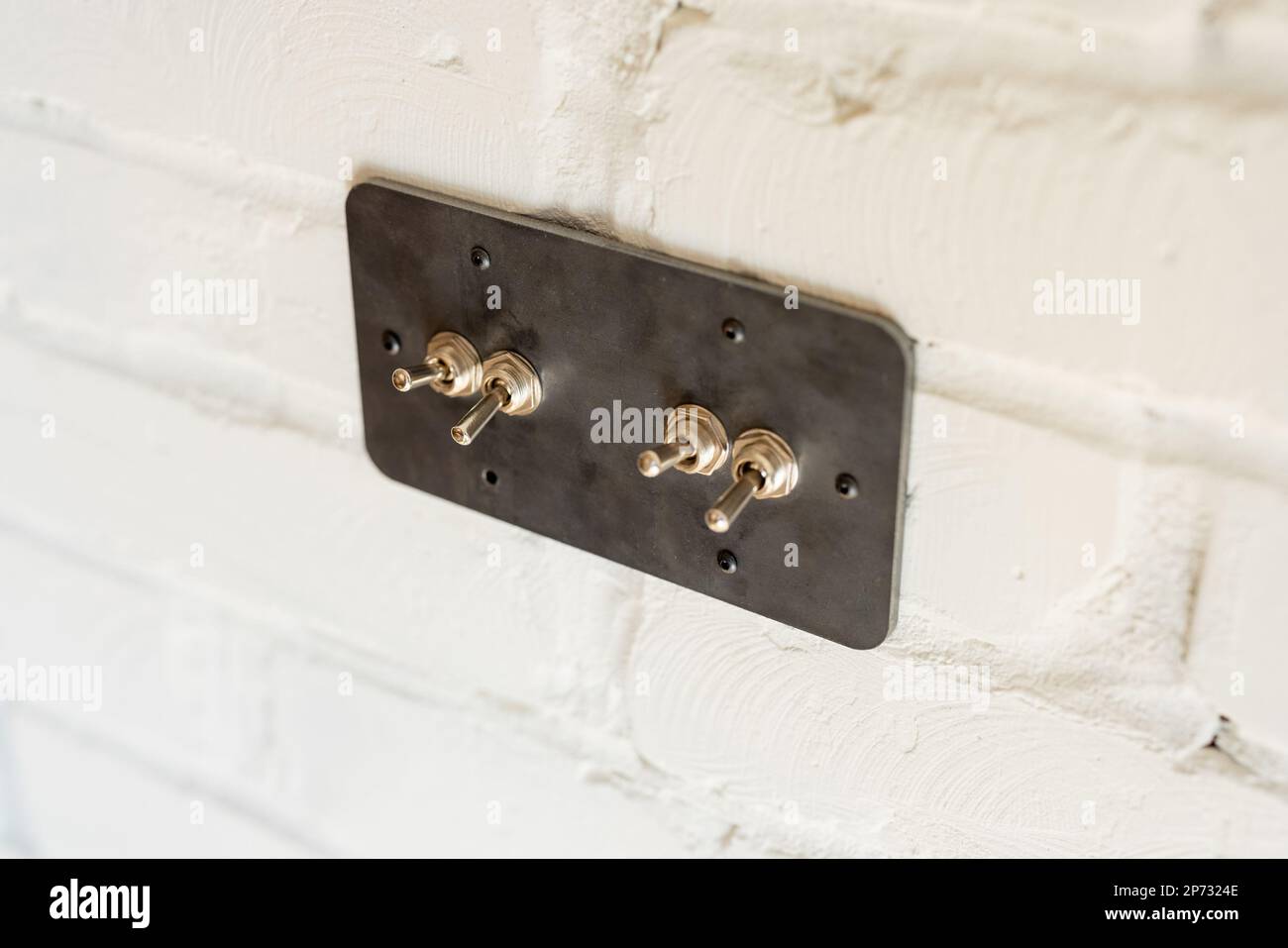 Light switch in loft style Stock Photo - Alamy