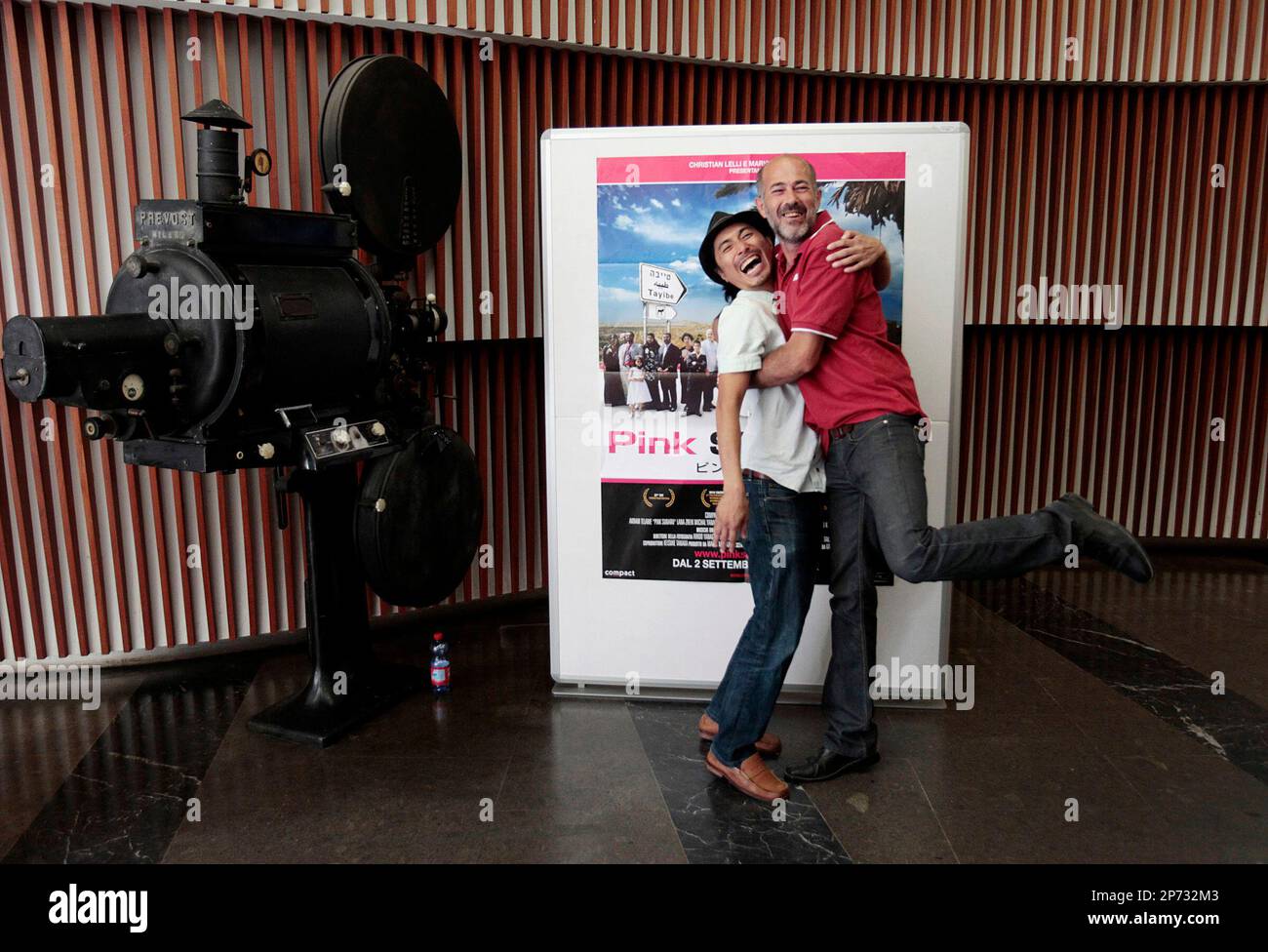 Japanese director Kazuya Ogawa, left, and actor Akram Telawe pose for ...