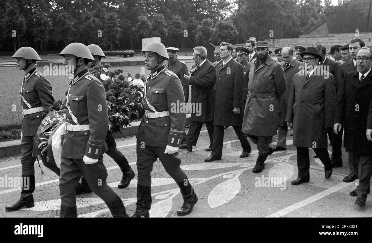 Cuban leader Fidel Castro, center with cap, attends a wreath-laying ...