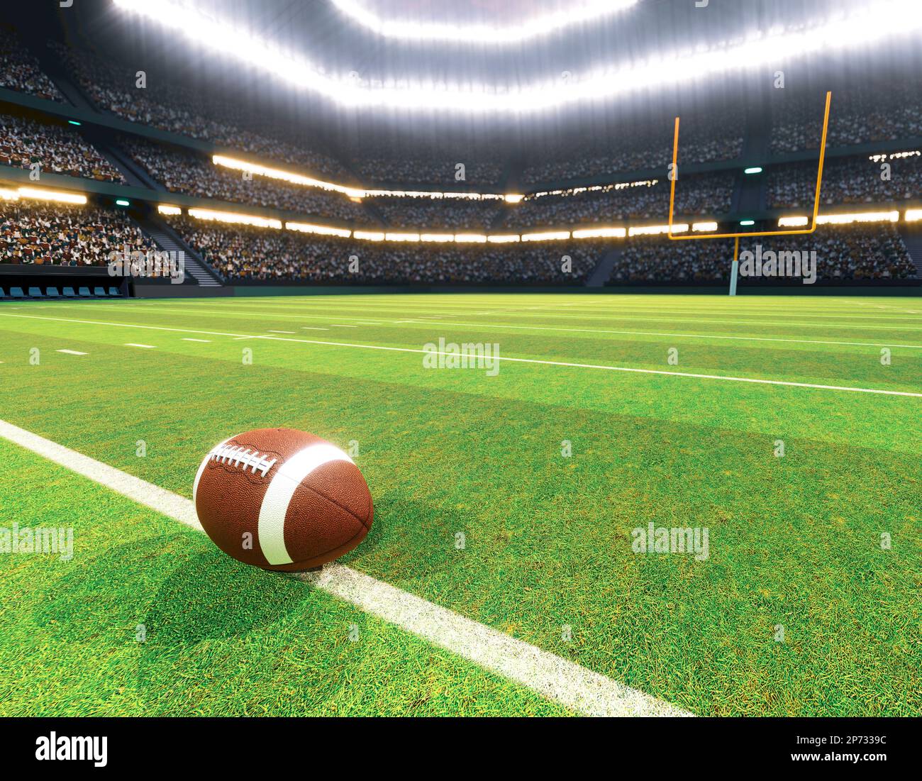 An American football on the centre line in a stadium with posts on a ...
