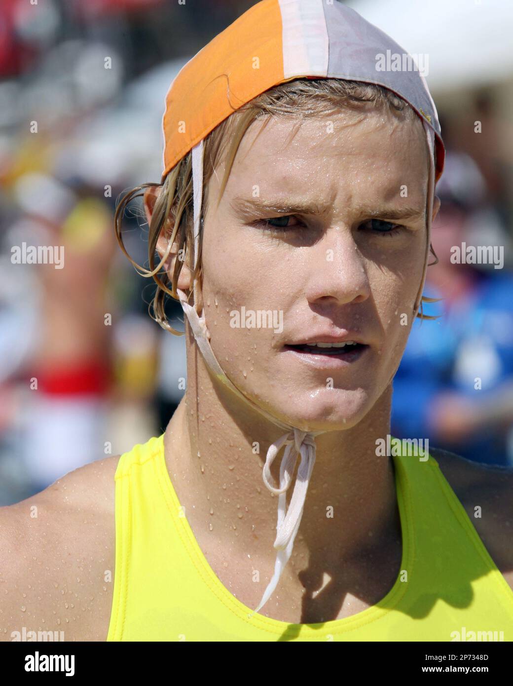 Hayden White, of Australia, crosses the finish line in the mens Taplin ...