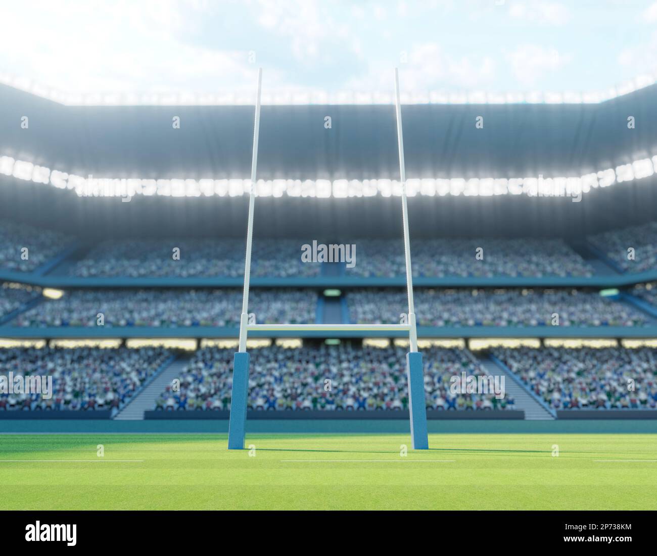 A rugby stadium with posts on a marked green grass pitch in the day ...