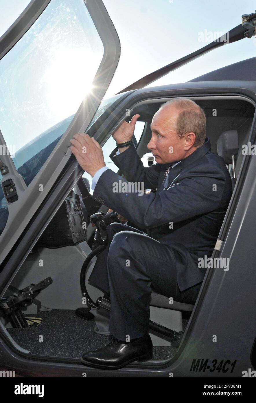 Russian Prime Minister Vladimir Putin seen in the cockpit of Russian Mi ...