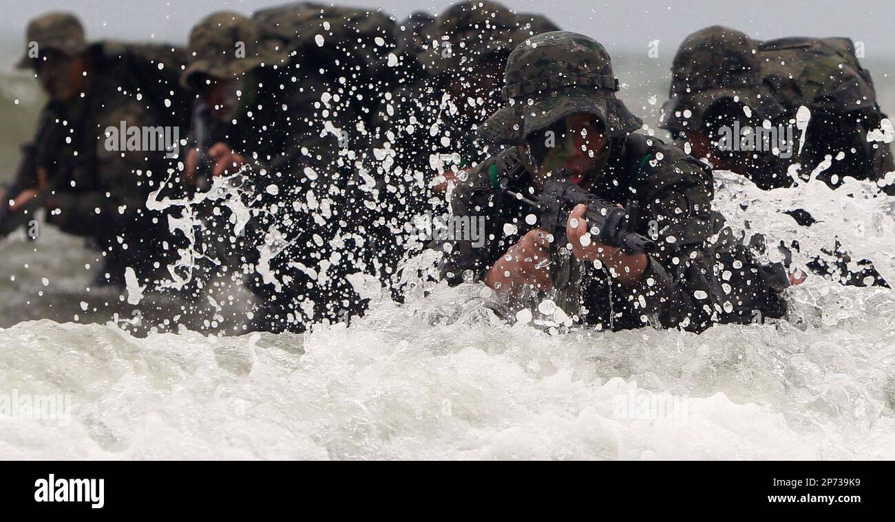 South Korean special warfare command soldiers hold their weapons during ...