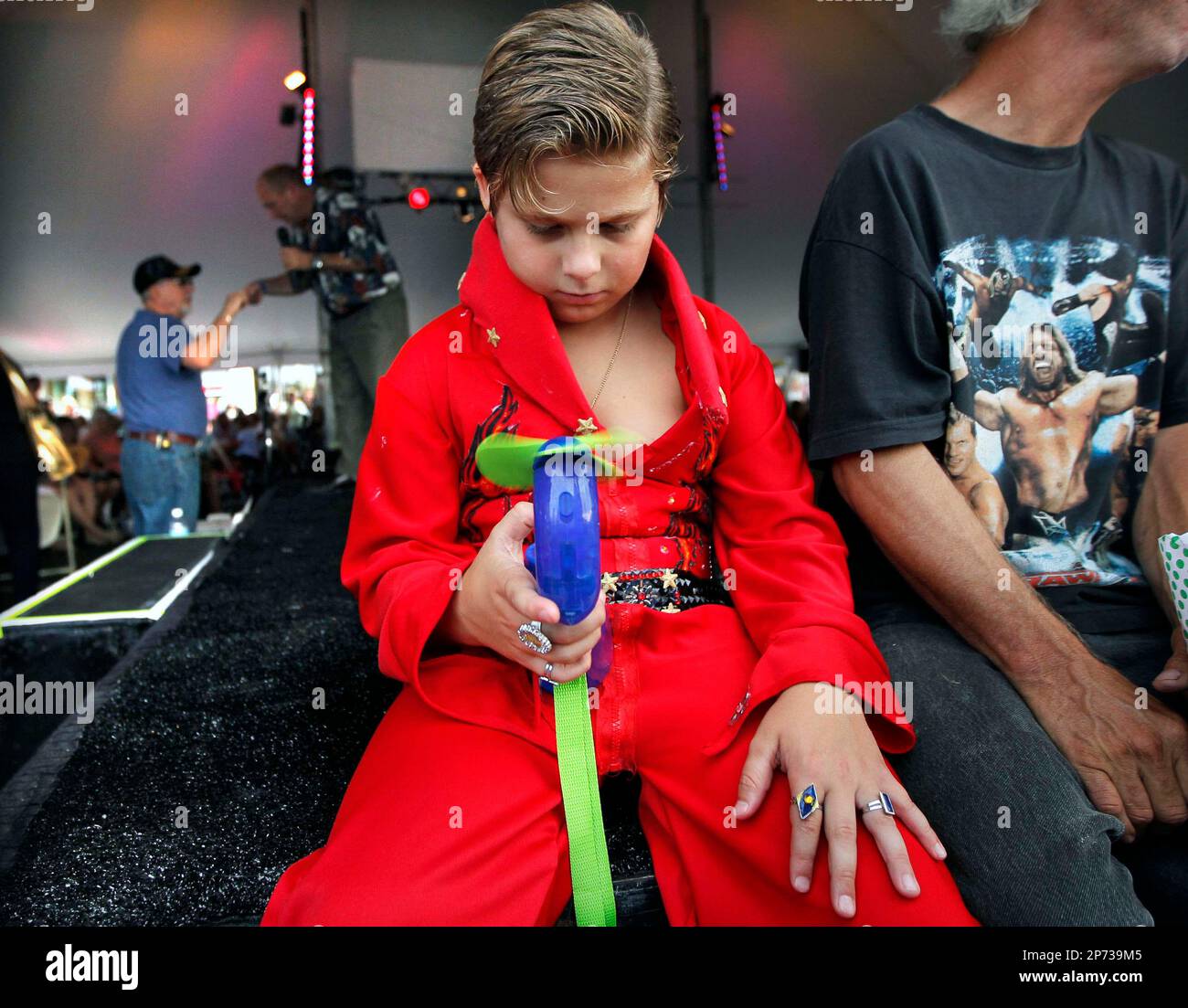 Brandon Bird, 9, tries to keep cool in his self-designed jumpsuit ...