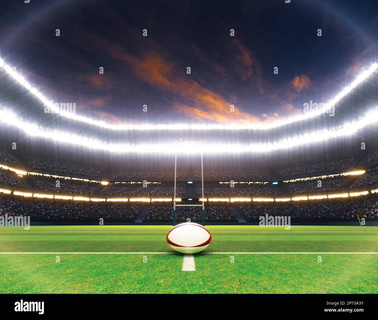 A rugby ball on the centre line of a rugby stadium with posts on a ...