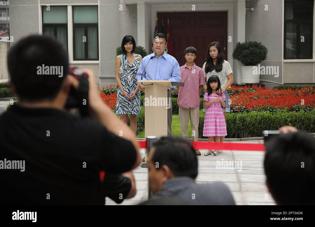 The new U.S. ambassador to China Gary Locke and his wife Mona Lee (L ...