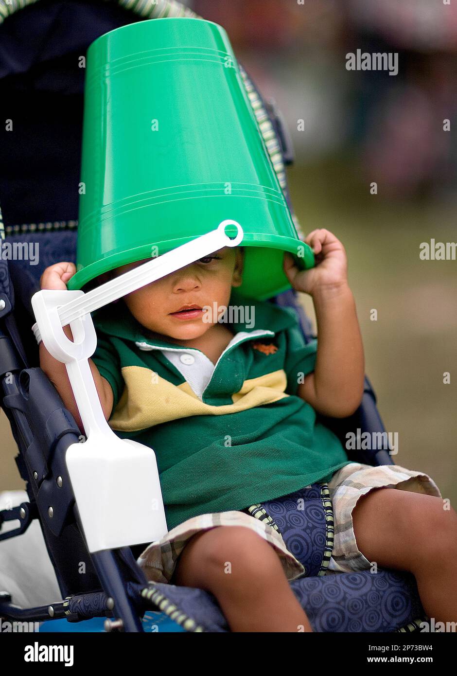 Wilmington, N.C. resident Cayden Sigmon, 15-months, rides in his ...