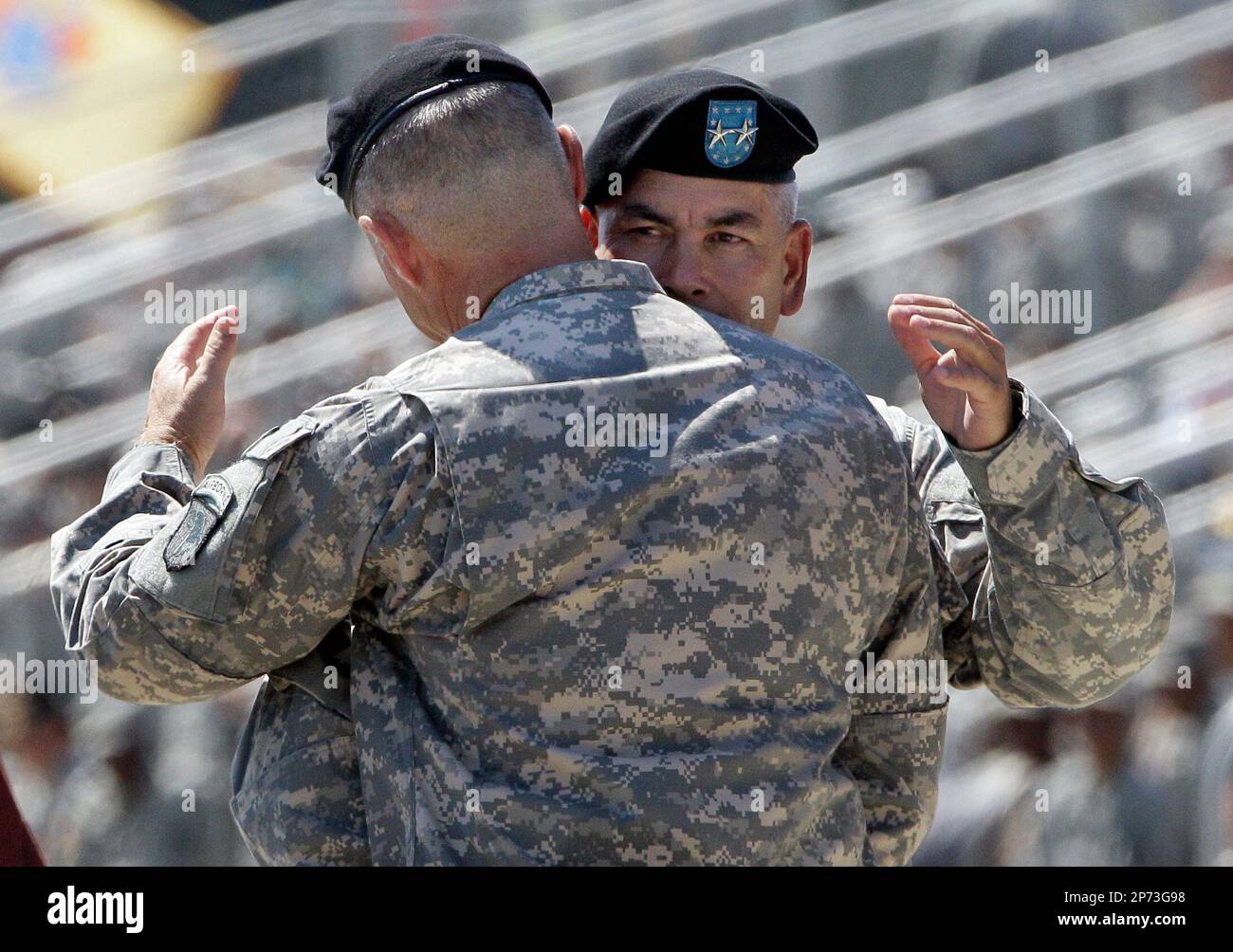 Maj. Gen. John F. Campbell, right, outgoing commander of the 101st ...