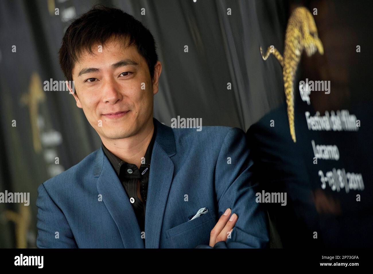 Japanese filmmaker Katsuya Tomita poses during a photo call prior to ...