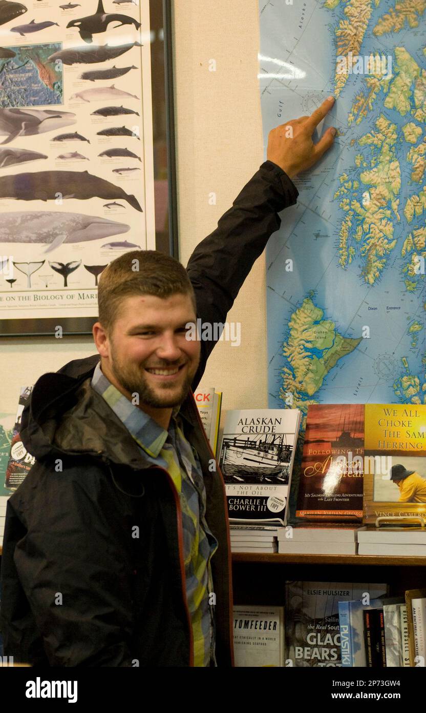 In this Aug. 4, 2011 photo, Mike MacFerrin points to south Baranof ...