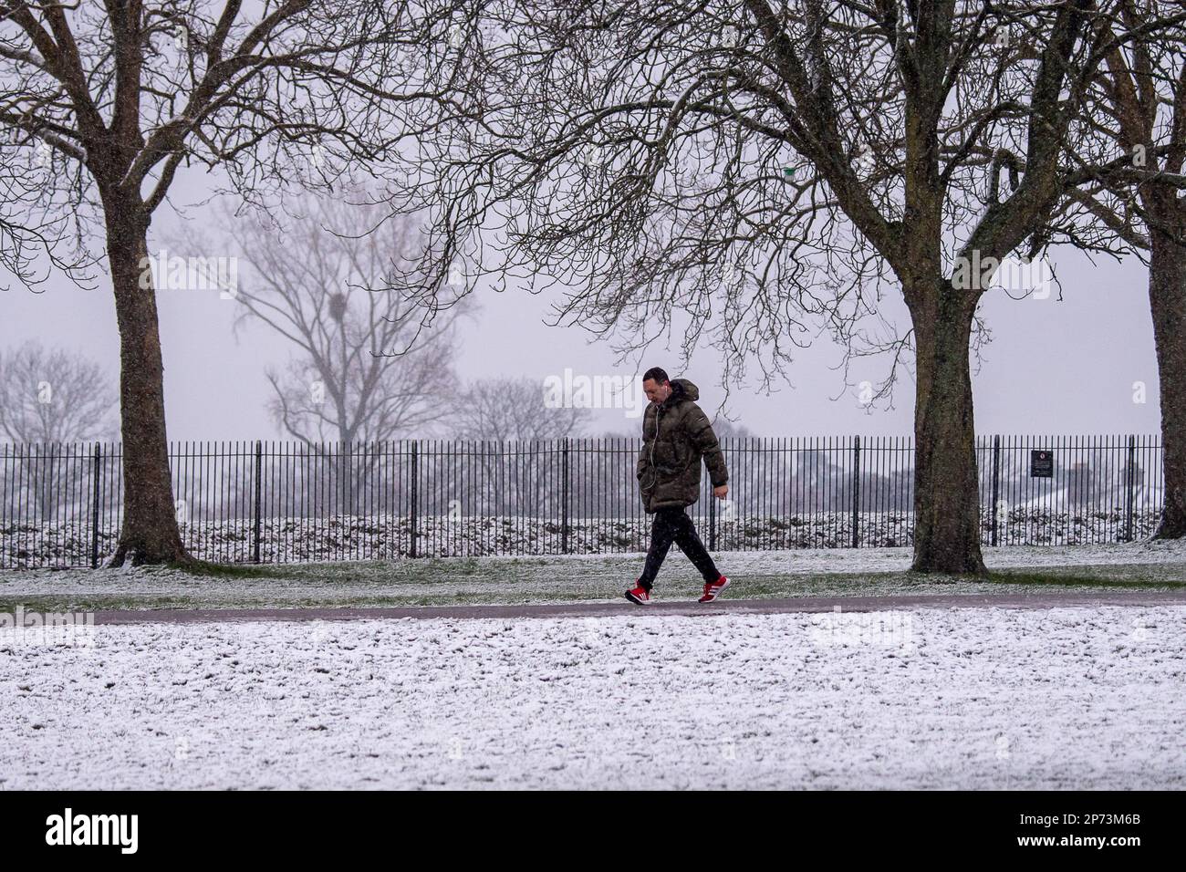 Windsor, Berkshire, UK. 8th March, 2023. Walkers and joggers were out ...