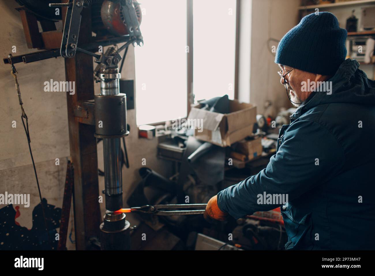 Iron automatic hammer hi-res stock photography and images - Alamy