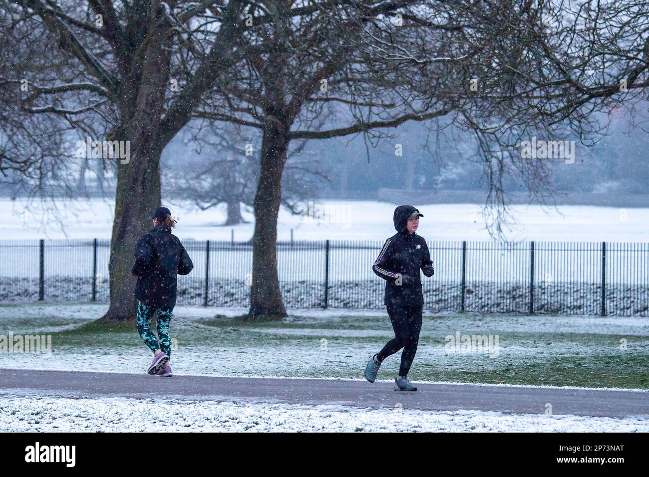 Windsor, Berkshire, UK. 8th March, 2023. Walkers and joggers were out ...
