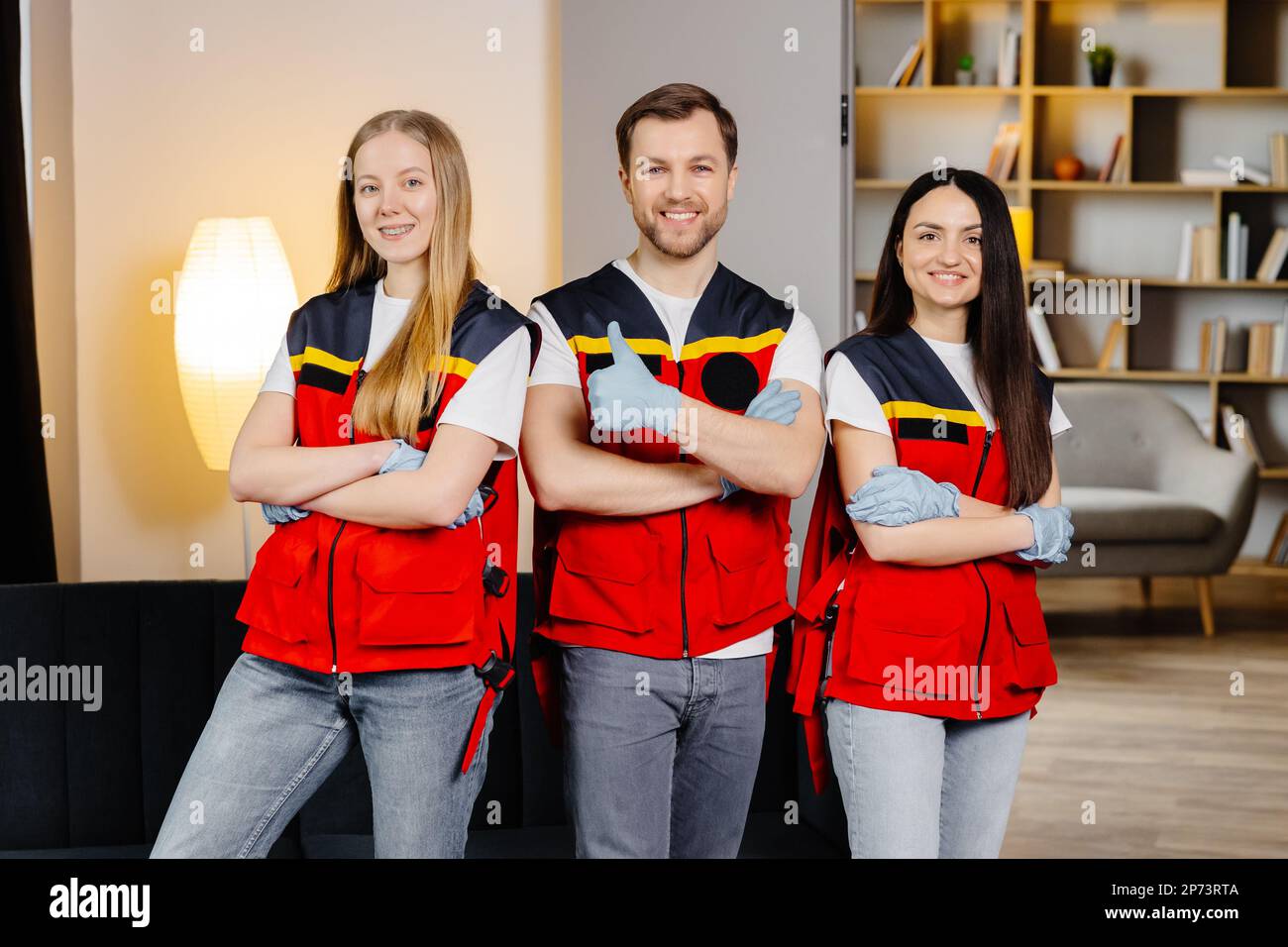 Group of people with cpr dummy looking at camera and smiling after ...