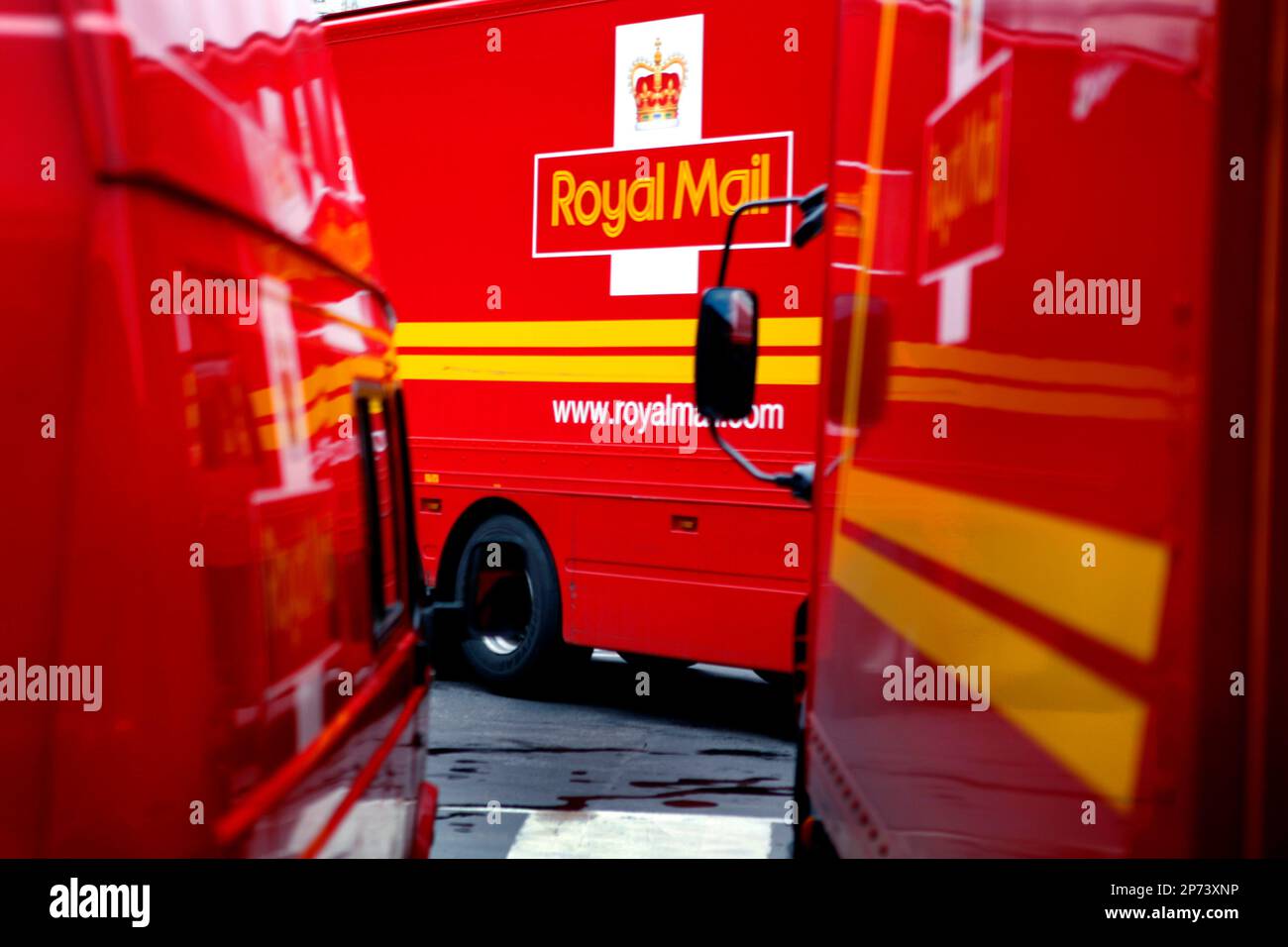 Royal Mail delivery lorries and minivans parked in the car park of the ...