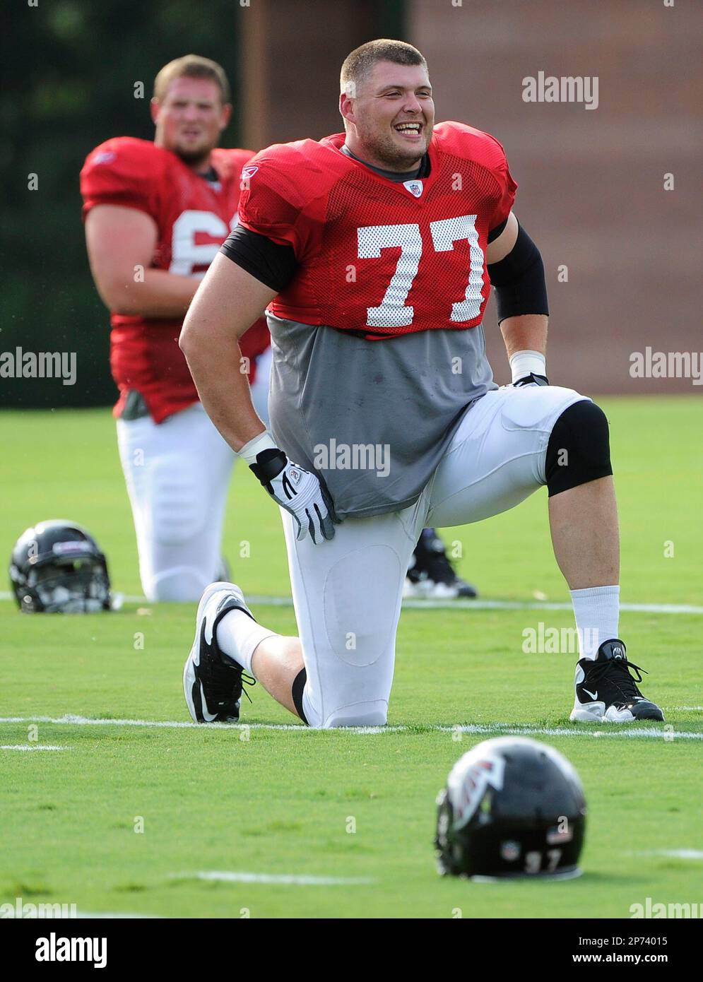 Atlanta Falcons offensive tackles Tyson Clabo (77) and Matt Murphy warm ...