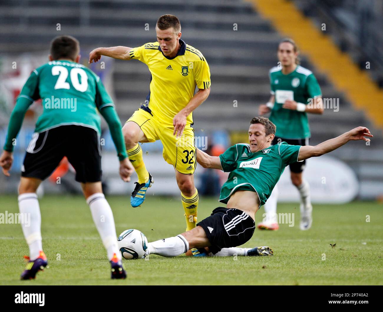 Anel Hadzic, left, and Florian Made, of SV Ried, challenge Broendby's ...