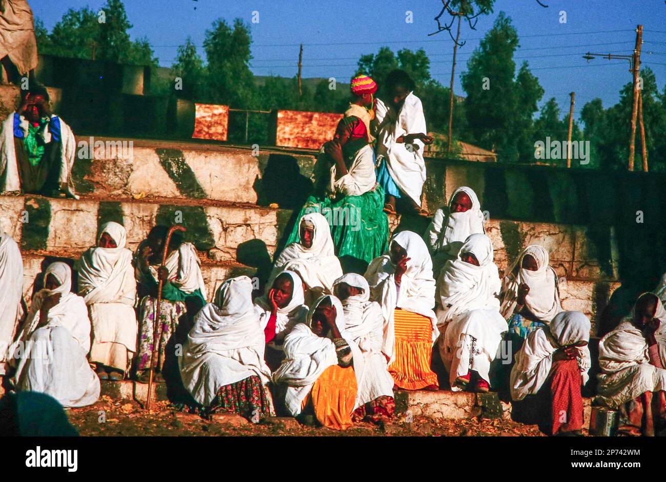 Lalibela, Ethiopia - June 24, 1998: people watch the morning ceremony ...