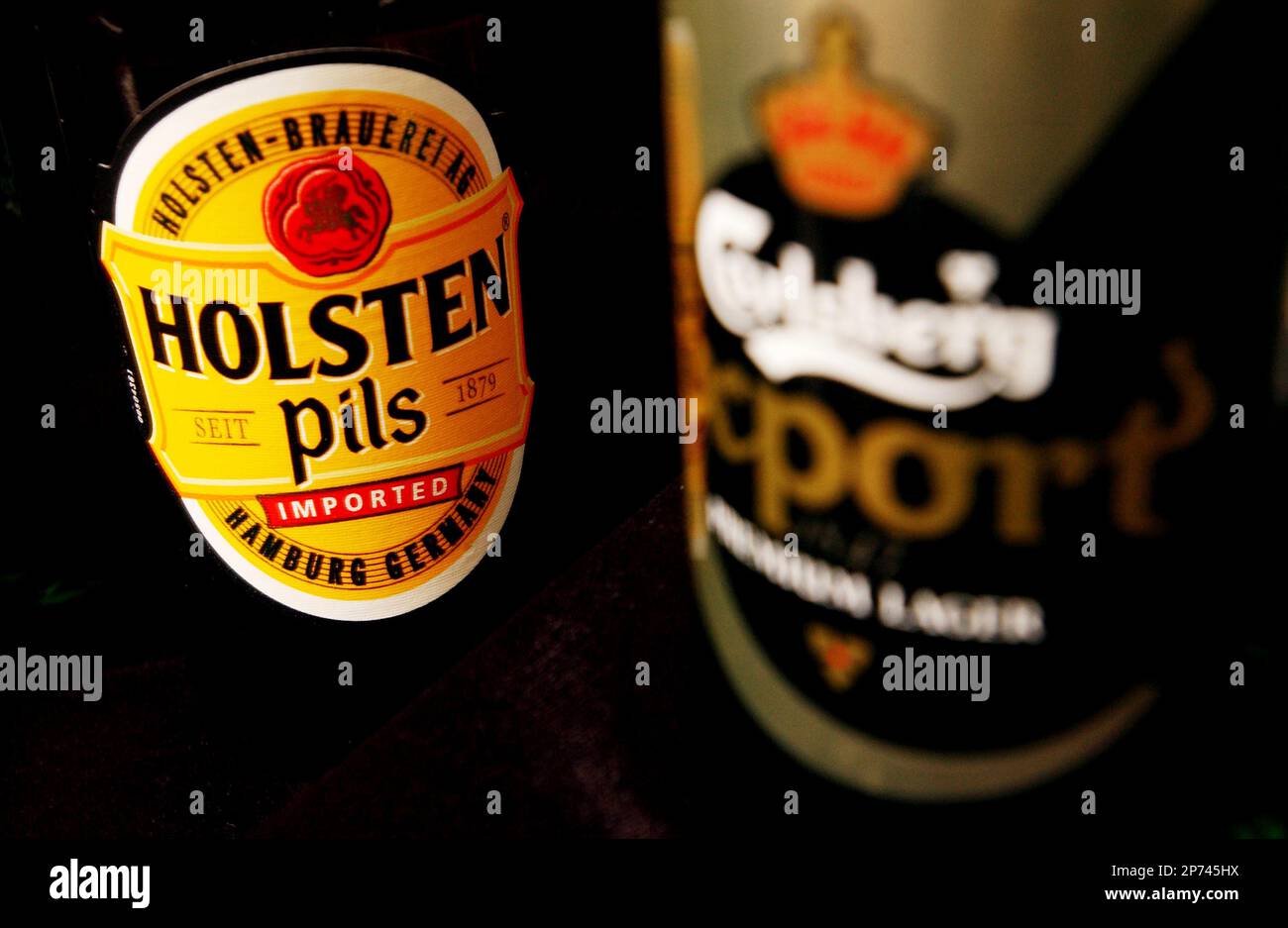 Pictured: A bottle of Holsten Pils, lager; a Carlsberg brand. (Newscast ...