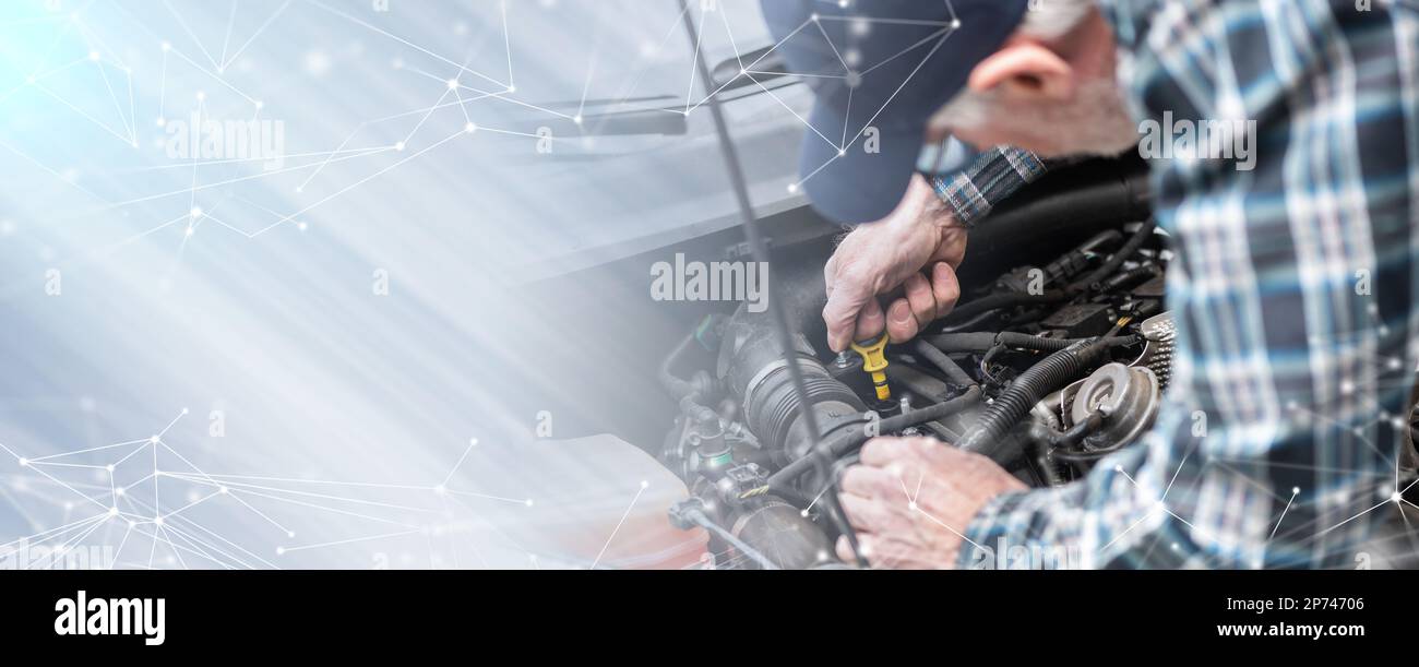 Car mechanic checking a car engine; panoramic banner Stock Photo - Alamy