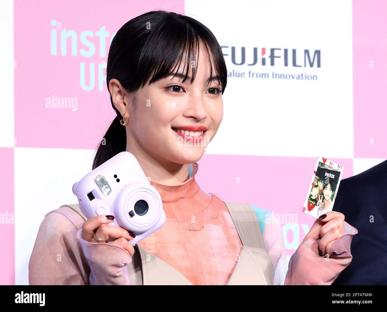 Tokyo, Japan. 8th Mar, 2023. Japanese actress Suzu Hirose displays the ...
