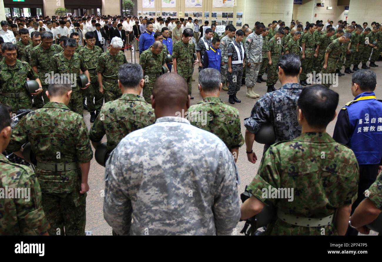 Members of U.S Army and Japan Self-Defense Forces (JSDF) observe a ...