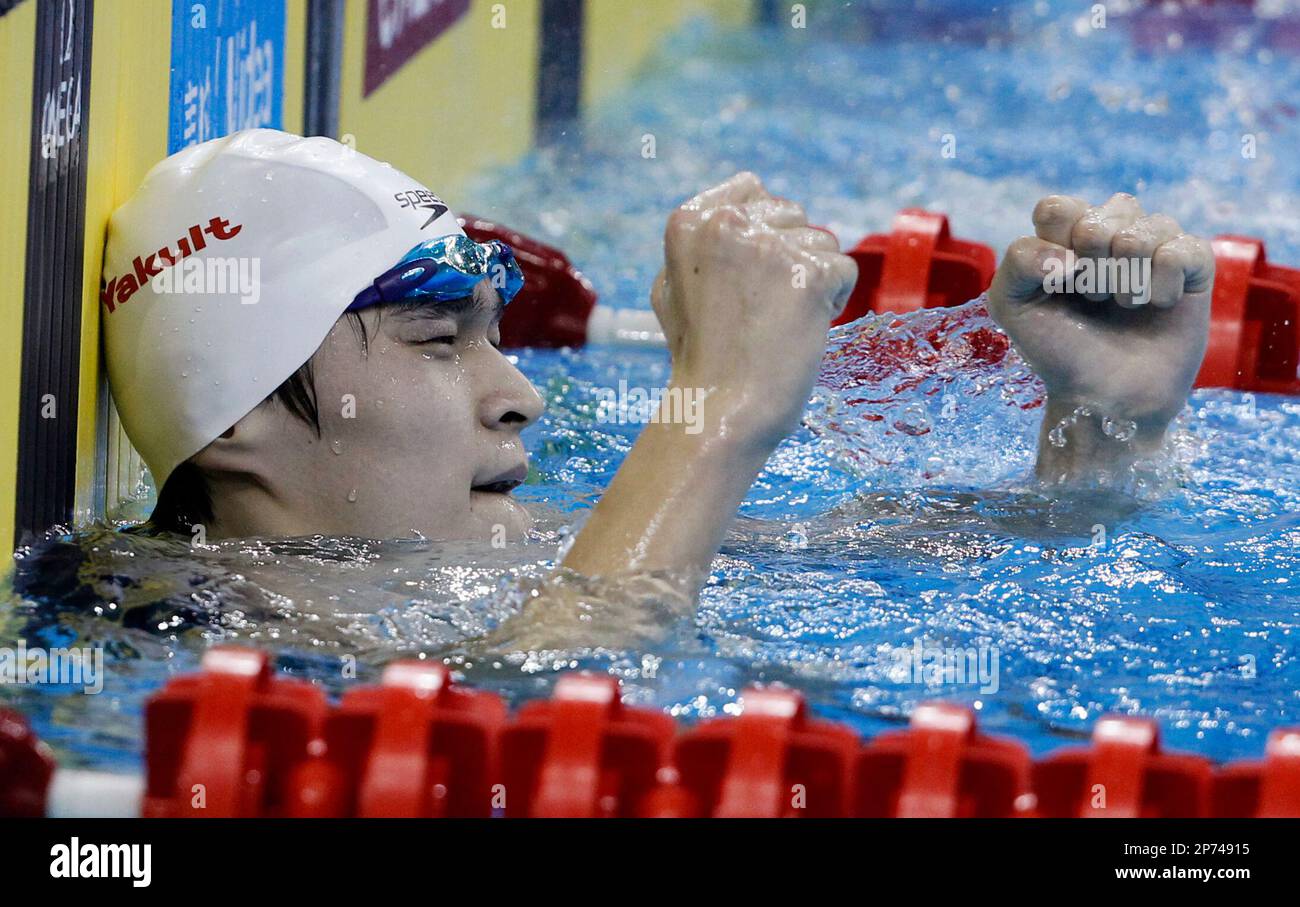 China's Sun Yang celebrates after winning the men's 1,500m Freestyle ...