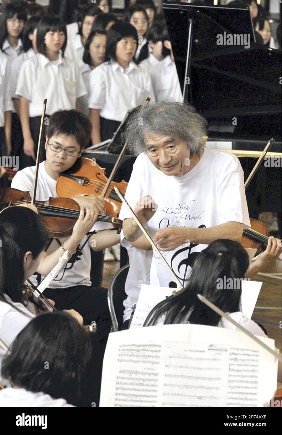 Japanese famous conductor Seiji Ozawa performs his baton at Yamanouchi ...