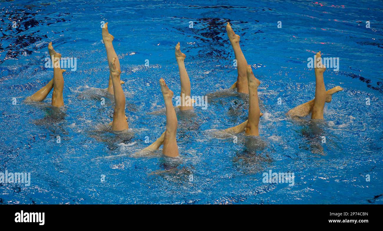 A synchronized swimming display takes place in the new aquatic centre ...