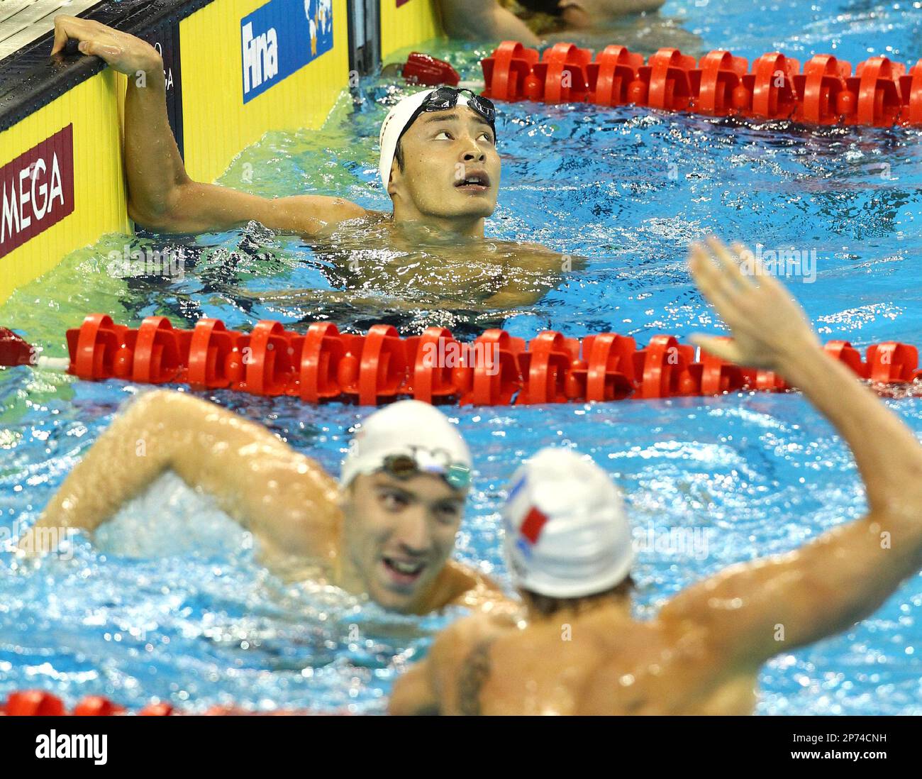 Japan's Ryosuke Irie (top) looks at the scoreboard after his heat at ...