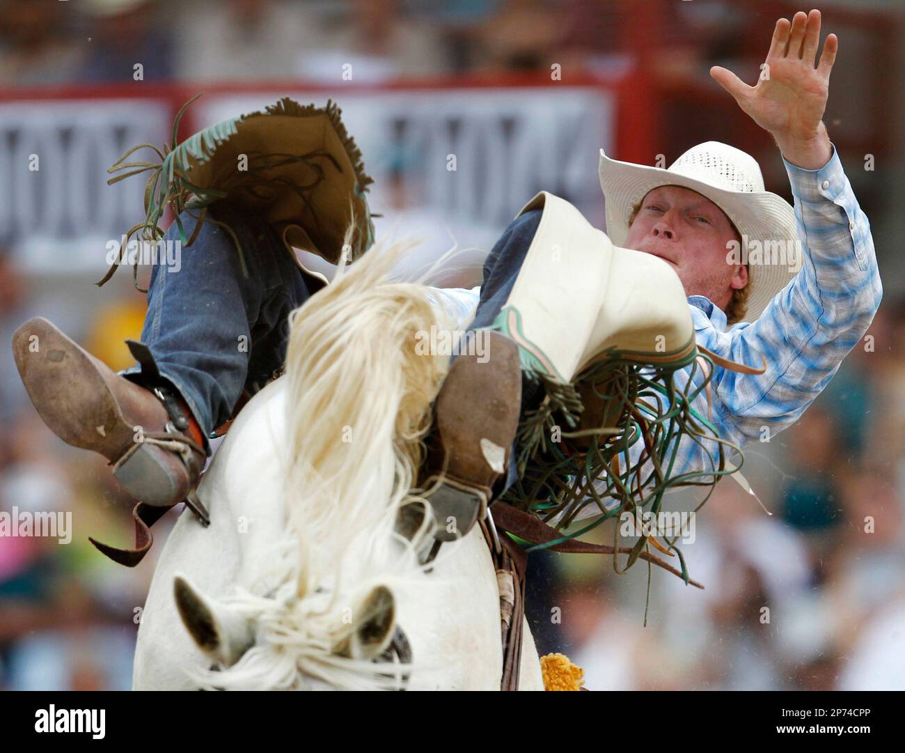 Lee Lantz, from Molalla, Ore., rides a horse named Pinball Rose during ...