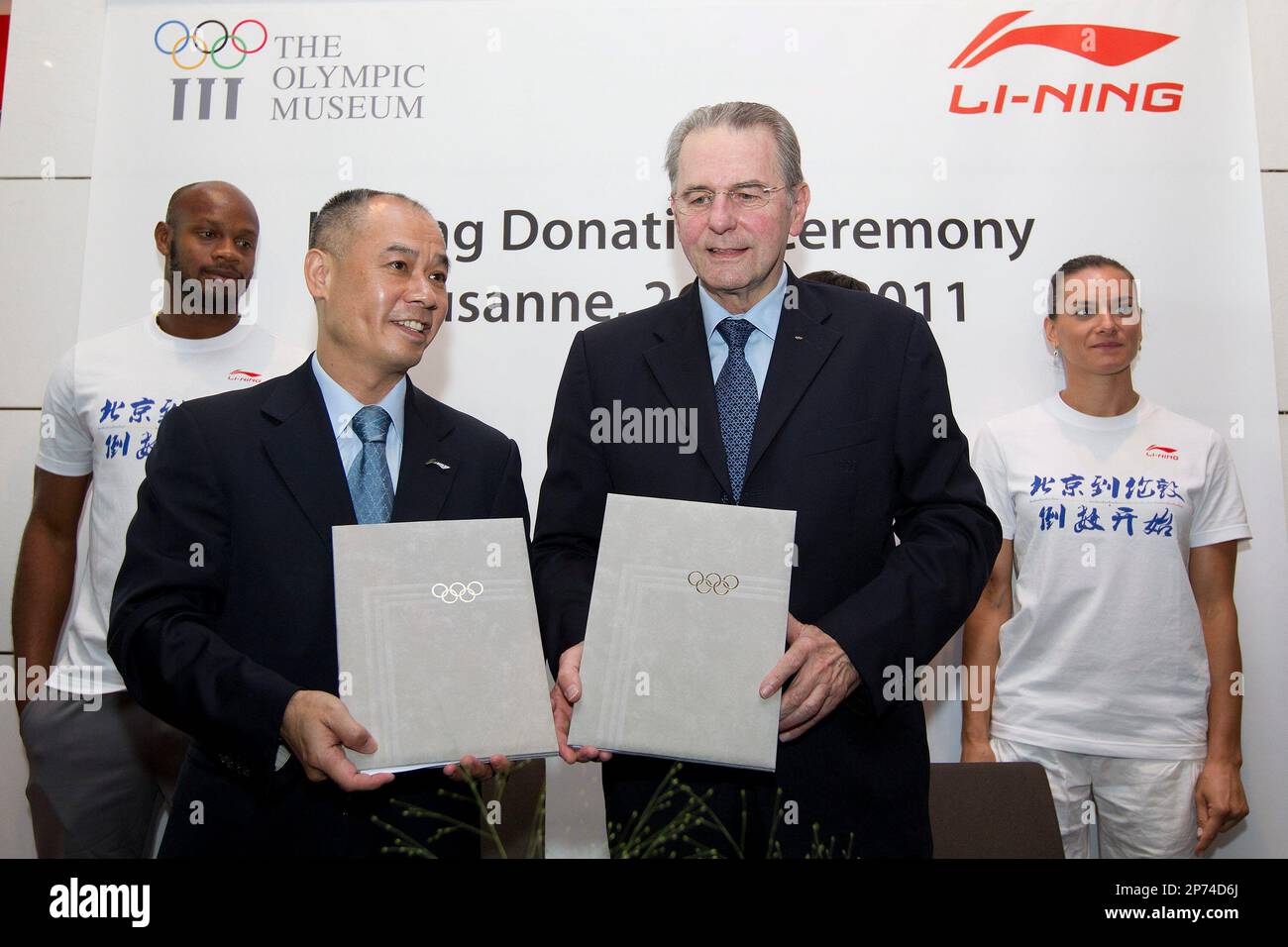 Li Ning, left, Chinese former Olympic gymnastics champion and founder ...