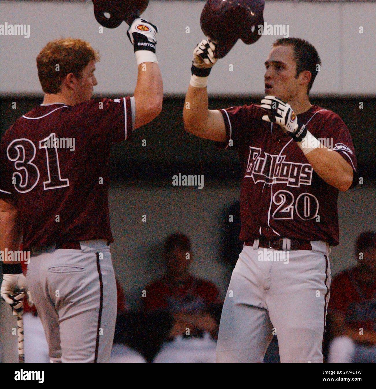 Mississippi STATE'S THOMAS Berkery (20) celebrates a solo home run with ...