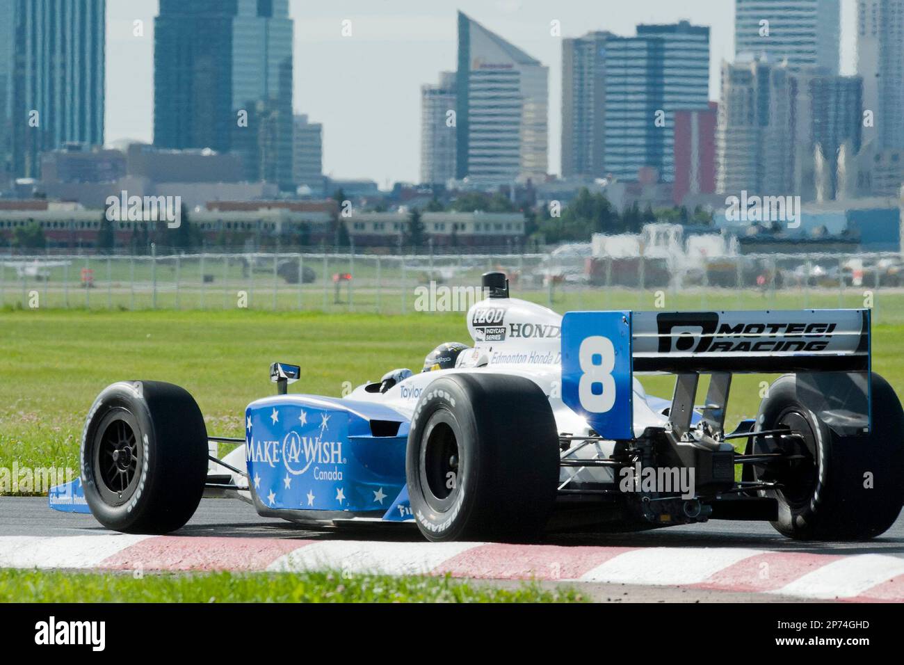 Canadian Paul Tracy exits turn five during the first practice session ...