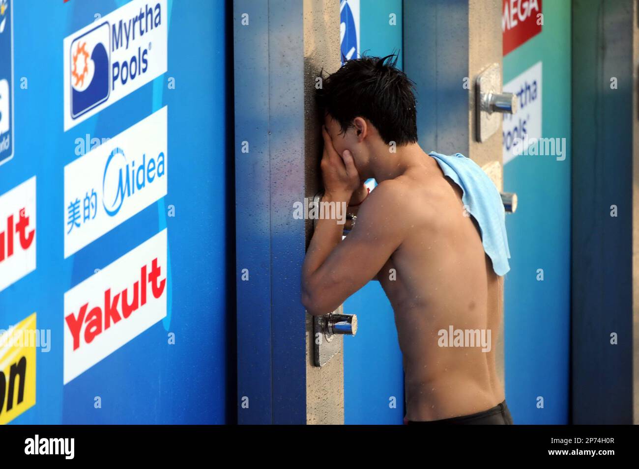Jul 22, 2011; Shangahi, CHINA; Qin Kai of China looks dejected after ...