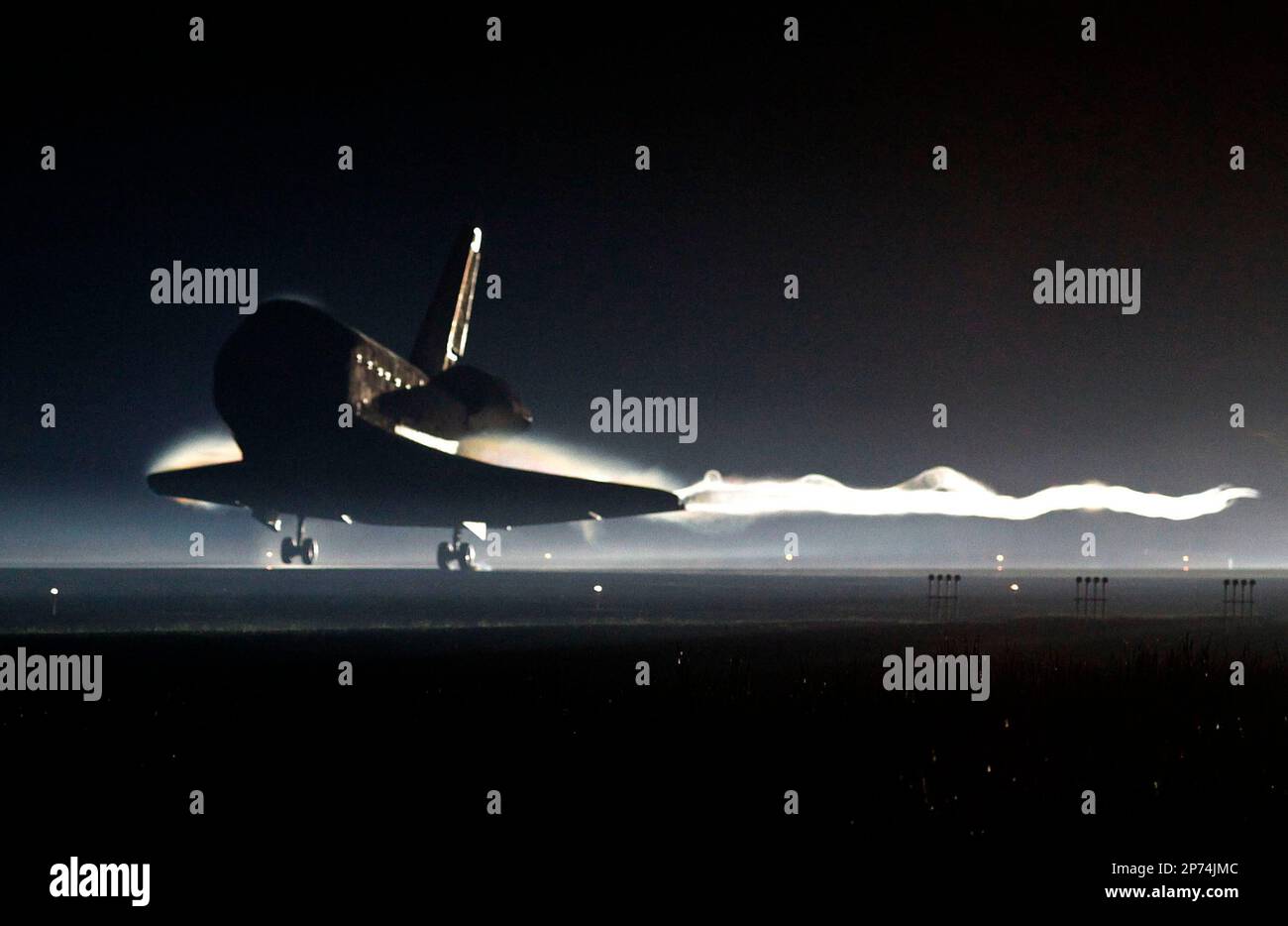 Space Shuttle Atlantis lands at the Kennedy Space Center at Cape ...